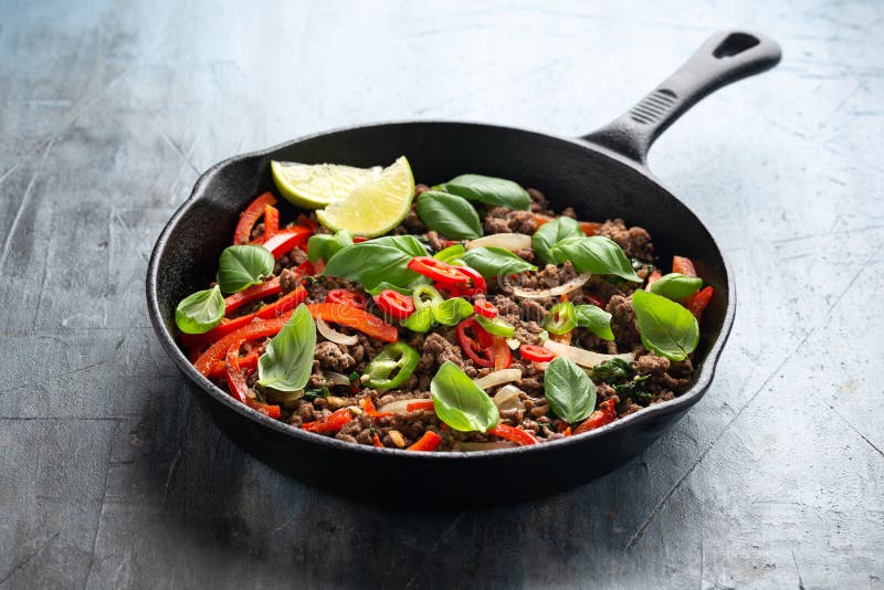 Pad Kra Pao Stir Fried Thai Basil, Minced Beef in Iron Cast Pan Stock ...
