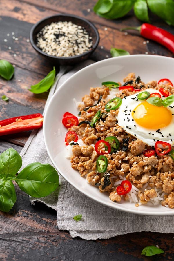Pad Krapow Gai, Thai Basil Chicken with Rice and Fried Egg Stock Image ...