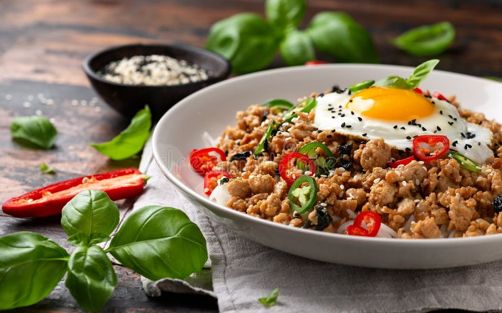 Pad Krapow Gai, Thai Basil Chicken with Rice and Fried Egg Stock Image ...