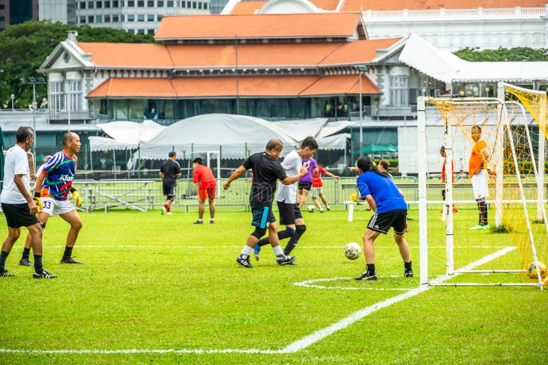 Foot Ball Activity on Padang Field, with Singapore Cricket Club in the ...