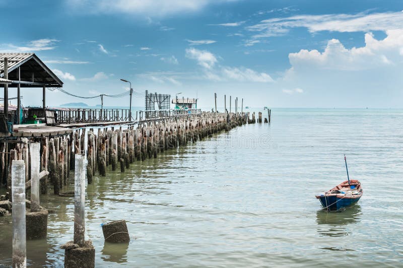 Paddle Boat and Bridge Fishing Pier Stock Image - Image of marketplace ...