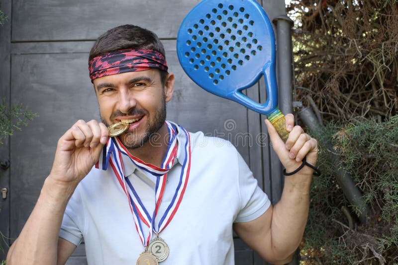 Paddle Player Holding a Bunch of Medals Stock Photo - Image of padel ...