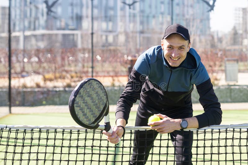 Paddle Player Resting Against the Wall Entertained by the Ball Stock ...