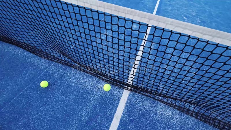Paddle Tennis Balls Hitting the Net of a Paddle Tennis Court Stock ...