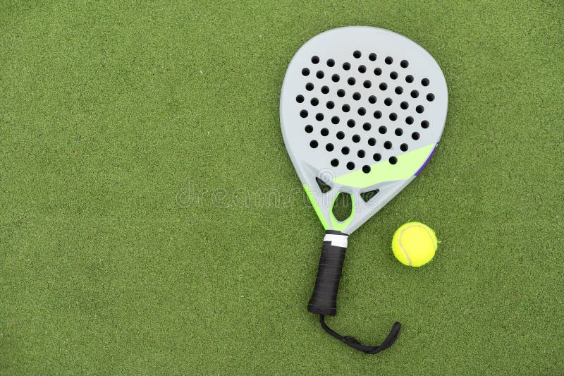Paddle Tennis Racket and Ball Stock Photo - Image of macro, grass ...