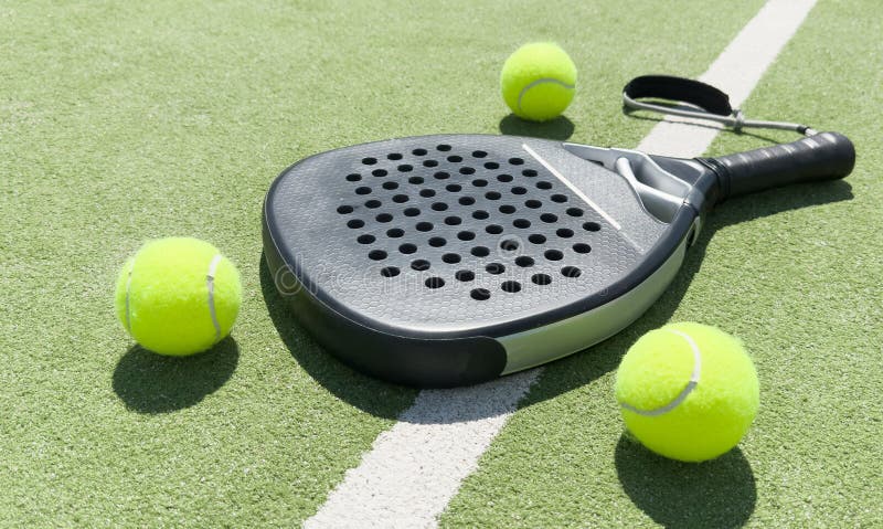 Paddle Tennis Racket and Balls on Court . High Quality Photo Stock ...