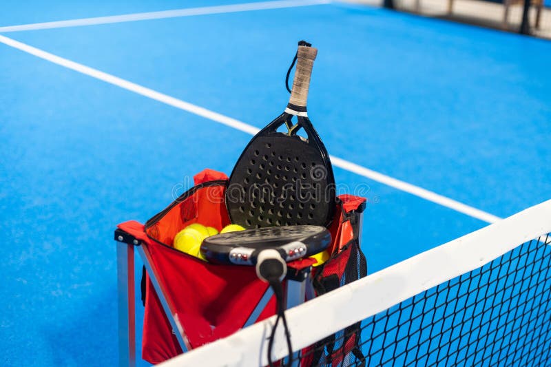 Paddle Tennis Racket and Balls on the Blue Paddle Court Stock Image ...
