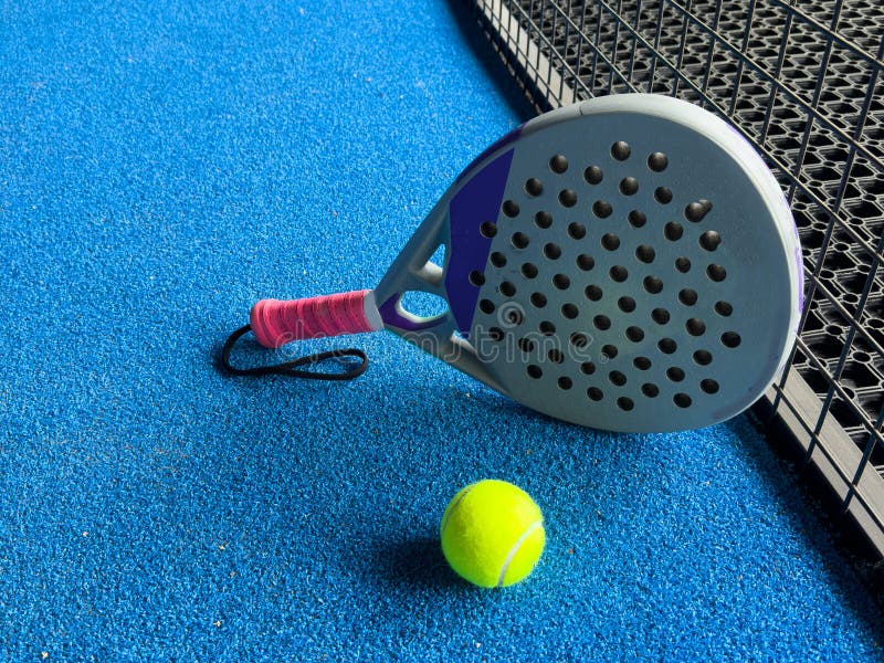 Paddle Tennis Racket and Balls on the Blue Paddle Court Stock Image ...