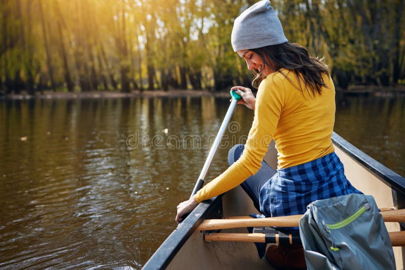 Paddle Time. a Young Woman Going for a Canoe Ride on the Lake. Stock ...