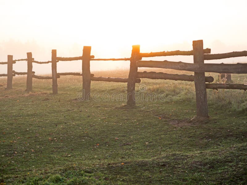 Paddock fence at sunrise stock photo. Image of rural - 62109442