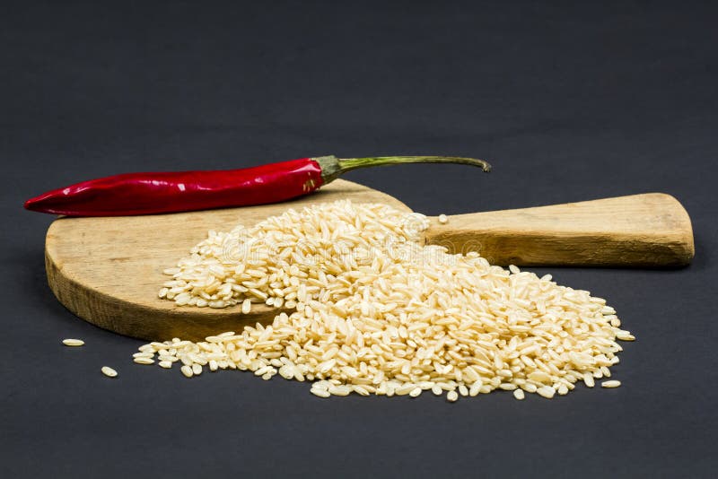Paddy rice and hot pepper stock image. Image of grain - 67285213