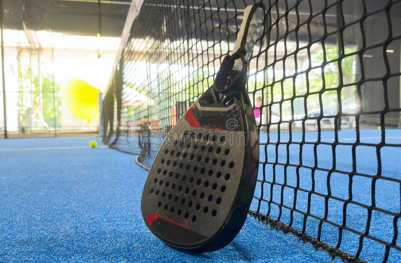 Padel Racket on a Padel Blue Court with a Ball Stock Photo - Image of ...
