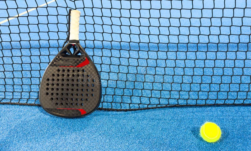 Padel Racket on a Padel Blue Court with a Ball Stock Photo - Image of ...