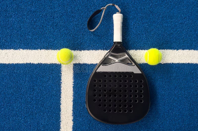 Padel Racket on a Padel Blue Court with a Ball Stock Image - Image of ...