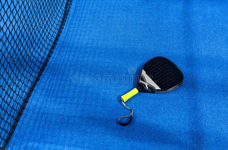 Padel Racket on a Padel Blue Court with a Ball Stock Photo - Image of ...