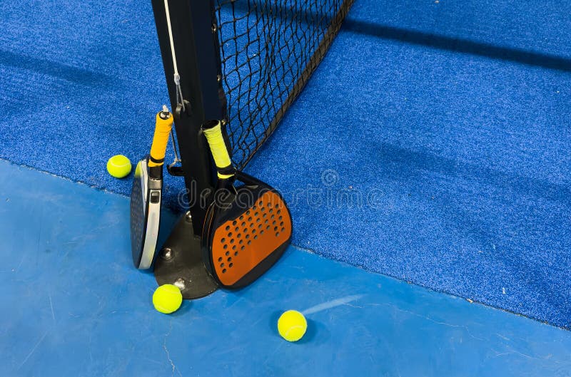 Padel Racket on a Padel Blue Court with a Ball Stock Photo - Image of ...