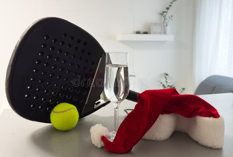 Padel racket and santa hat stock image. Image of athletic - 352059023
