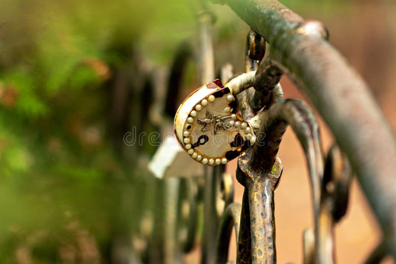 A Padlock is Attached To a Chain Link Fence Stock Image - Image of ...