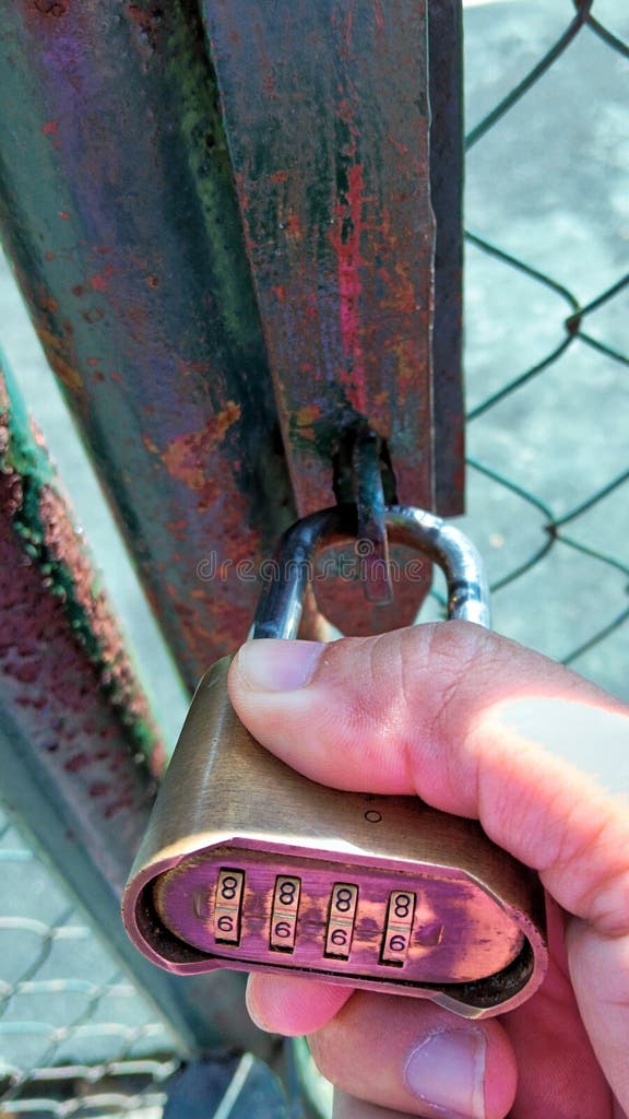 A Padlock Being Held by Hand. the Latest Padlock that Does Not Use a ...