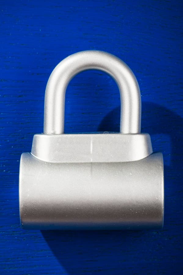 Padlock on blue stock photo. Image of steel, secrecy - 35603890