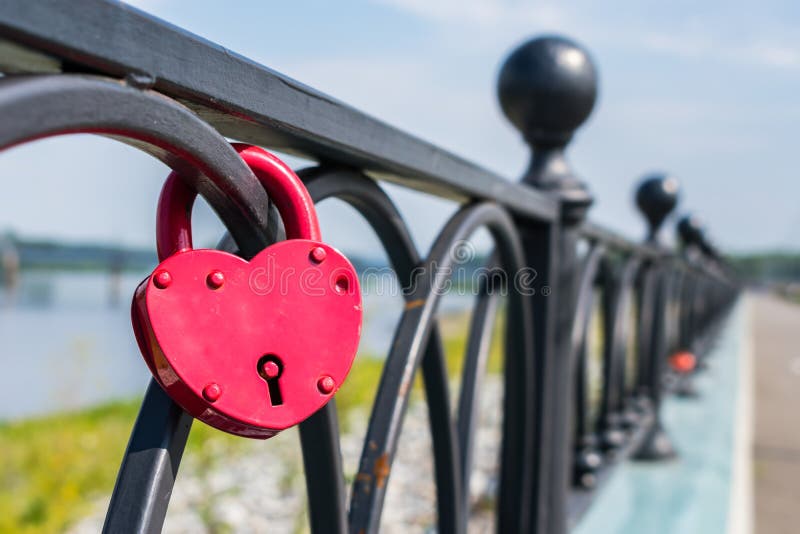Padlock Closed on the Railing of the Bridge after the Wedding Ceremony ...