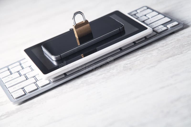 Padlock with Computer Keyboard, Smartphone and Tablet. Internet and ...