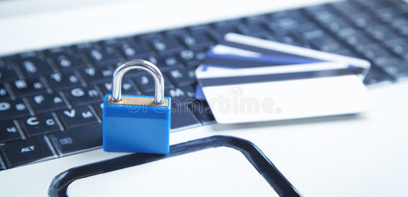 Padlock and Credit Cards on the Computer Keyboard. Credit Card Security ...