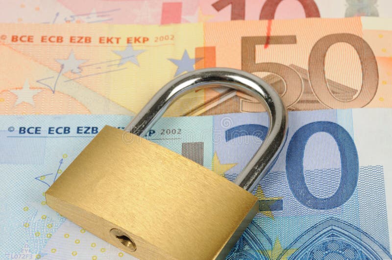 A Close Up of a Padlock and the End of a Storage Unit Corridor ...