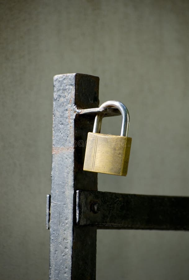 Padlock on Gate at Construction Site - Lock on Closed Fence. Stock ...