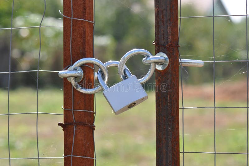 Padlock on gate stock photo. Image of locked, security - 4182420