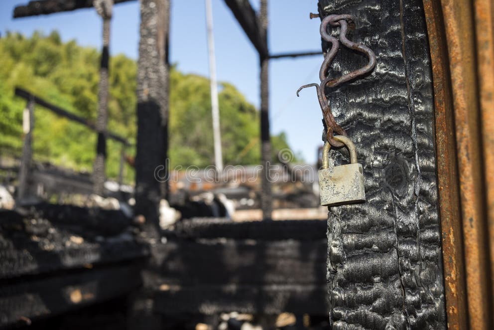 Padlock Hanging on a Pillar Stock Photo - Image of disaster, calamity ...