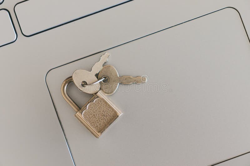 Padlock and Keys on a Laptop Touchpad. Computer Security Concept Stock ...
