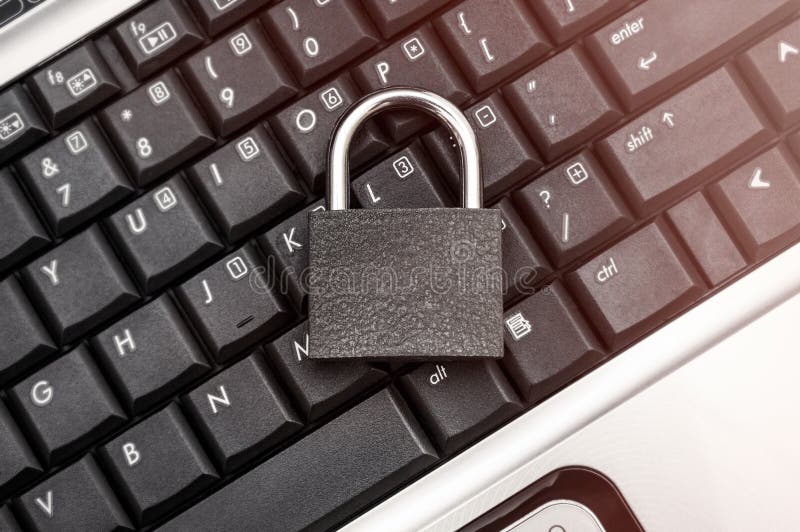 Padlock on the Laptop Keyboard. Top View Stock Photo - Image of secure ...
