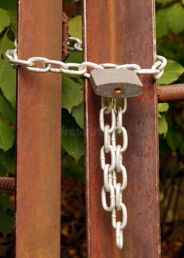 Padlock on the Metal Chain, Locking the Entrance. Stock Photo - Image ...