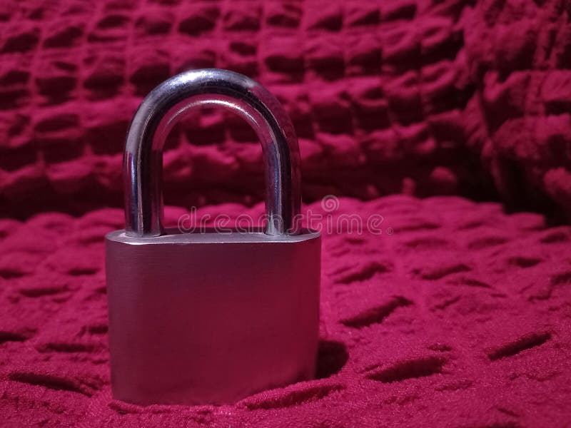 Padlock on Red Cloth. Security Concept Stock Photo - Image of concept ...