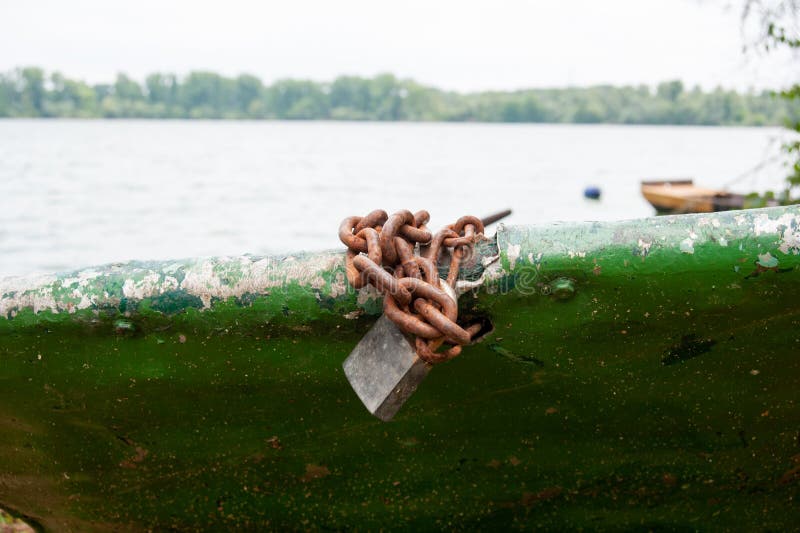 Padlock and Rusty Chain on Boat Stock Image - Image of boat, brown ...