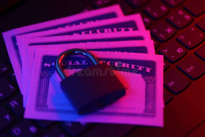 Padlock and Social Security Card on Computer Keyboard. Identity Theft ...