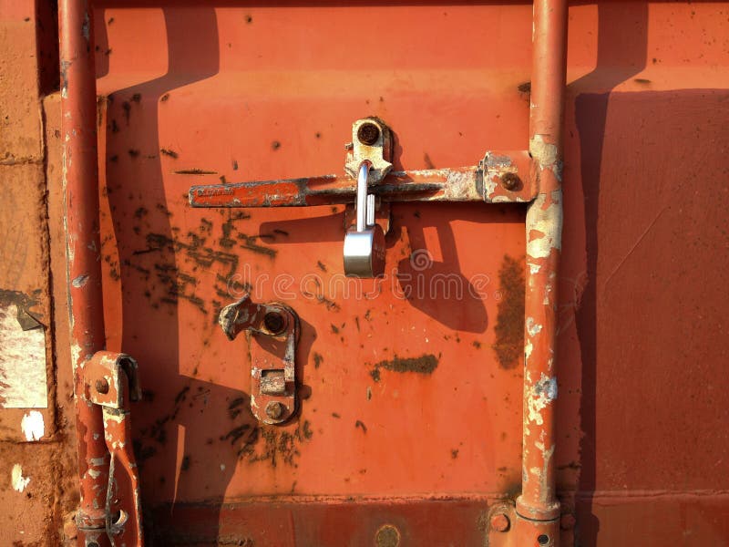 Padlocked Lock of a Rusted Container Stock Photo - Image of rust, light ...