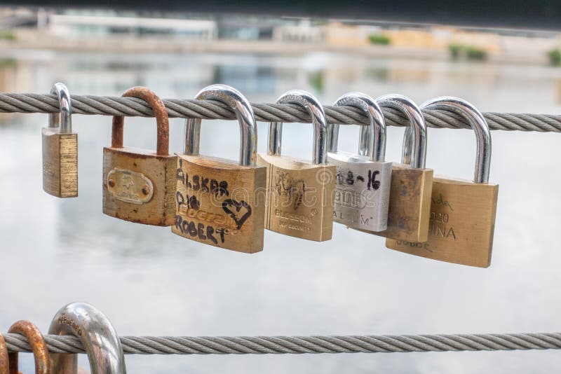 Love locks on wire editorial photography. Image of bridge - 95647197