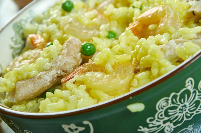 Paella with cod and shrimp stock photo. Image of sauce - 149294884
