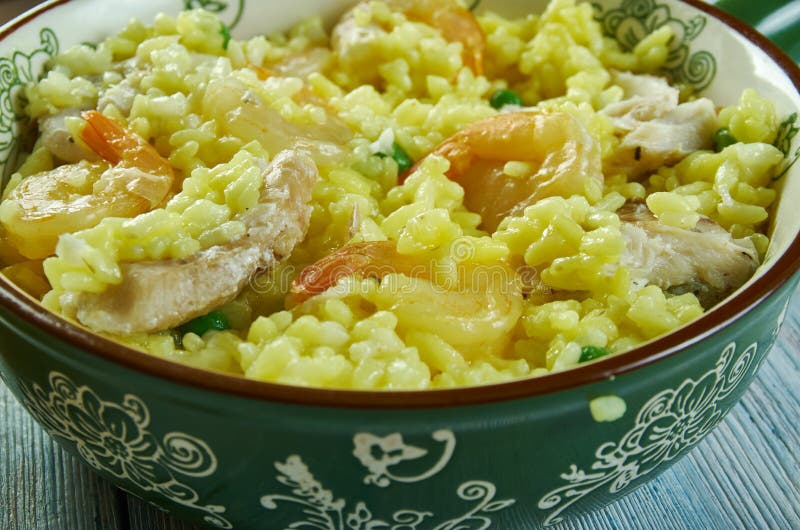 Paella with cod and shrimp stock photo. Image of dish - 149524988