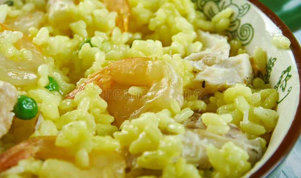 Paella with cod and shrimp stock photo. Image of seafood - 151854620