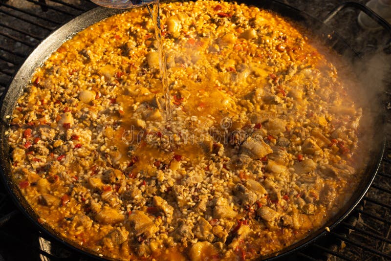 Paella Cooked Over Firewood, Spanish Dish Stock Photo - Image of rice ...
