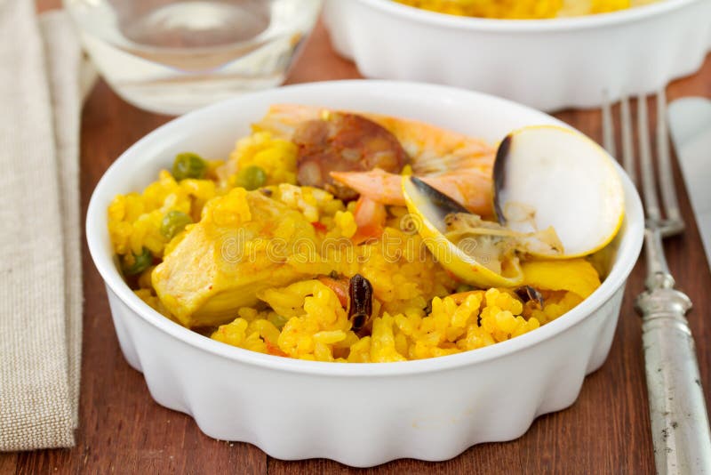 Paella in white bowl stock photo. Image of spain, mediterranes - 32752822