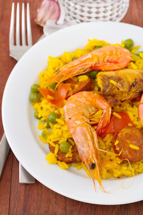 Paella on white plate stock photo. Image of paella, vegetables - 45765160