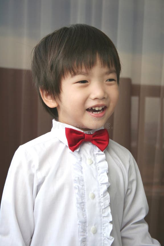 Page Boy with Red Bow-tie Smiling Stock Image - Image of youth, formal ...