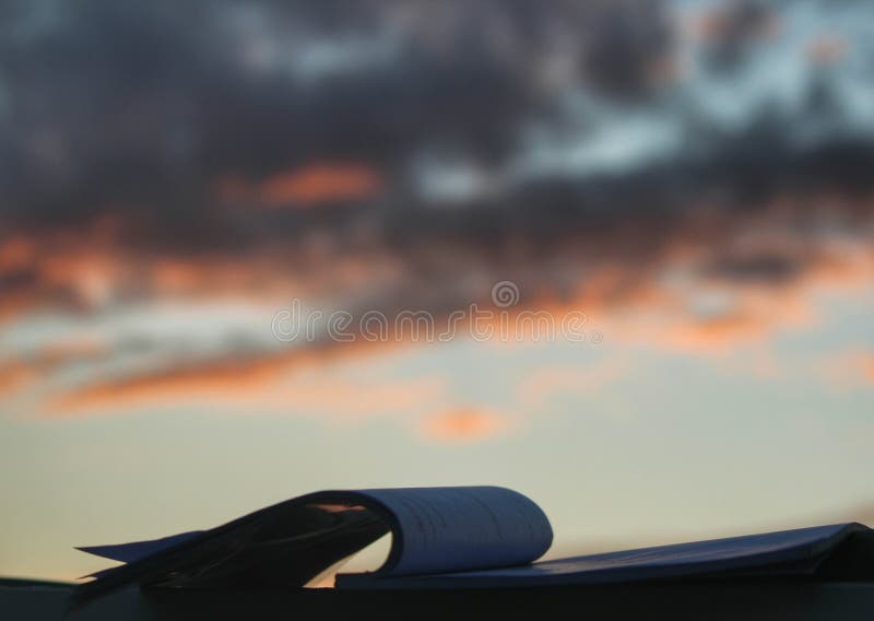 Pages of a Book during Sunset with the Clouds Stock Photo - Image of ...