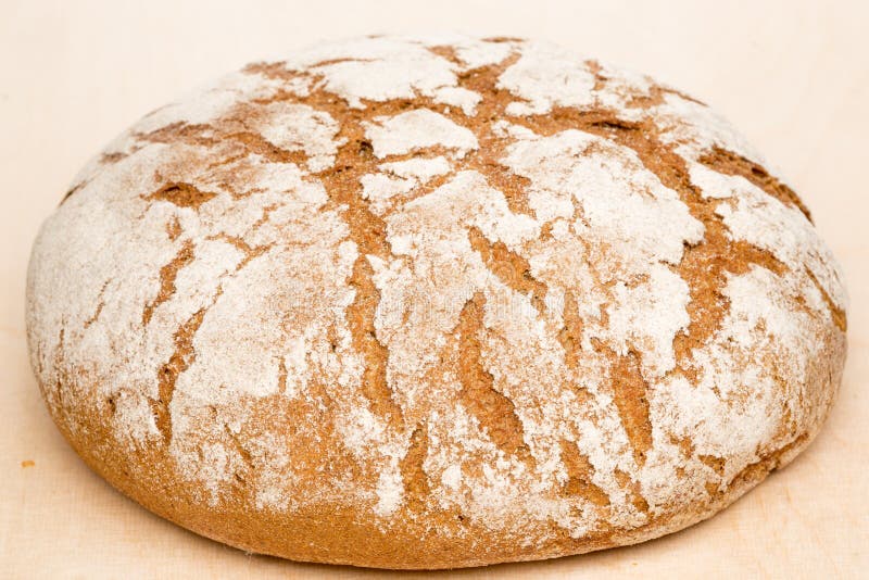 Pain de pain rond photo stock. Image du personne, vivacité - 51694950