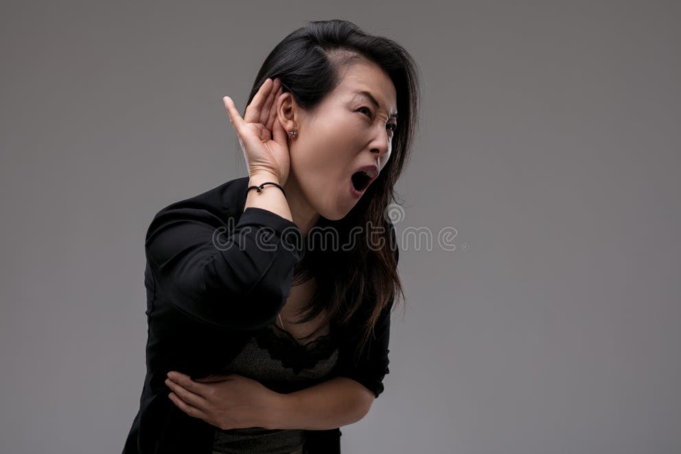 Expresses Hearing Difficulty with a Surprised Grimace or What Th Stock ...