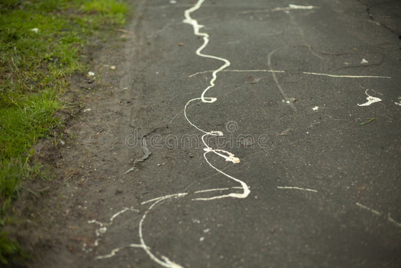 Paint on Asphalt. Splashes of White Paint on Road Stock Photo - Image ...